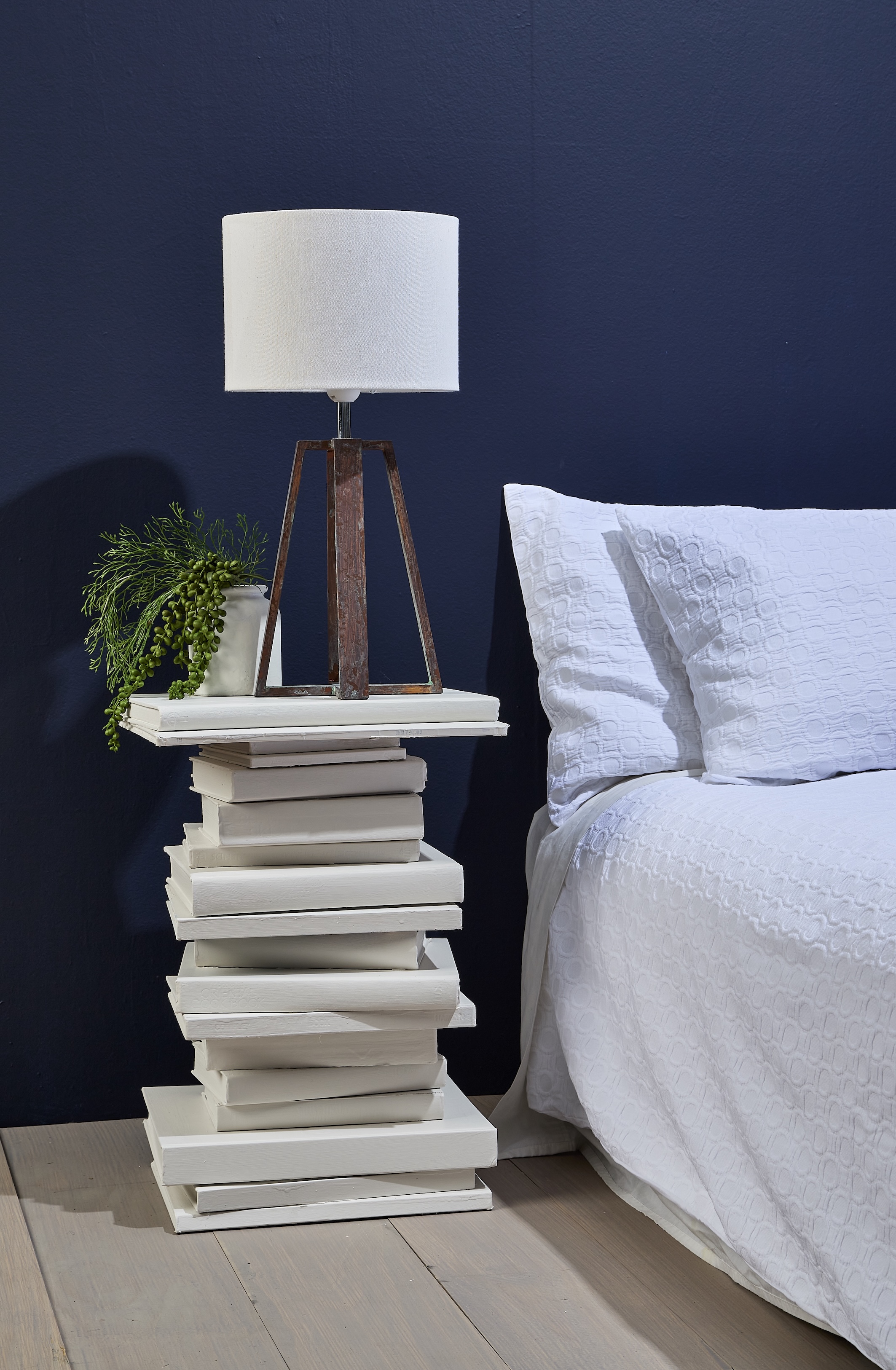 How to create your own stacked books bedside table | Habitat by Resene