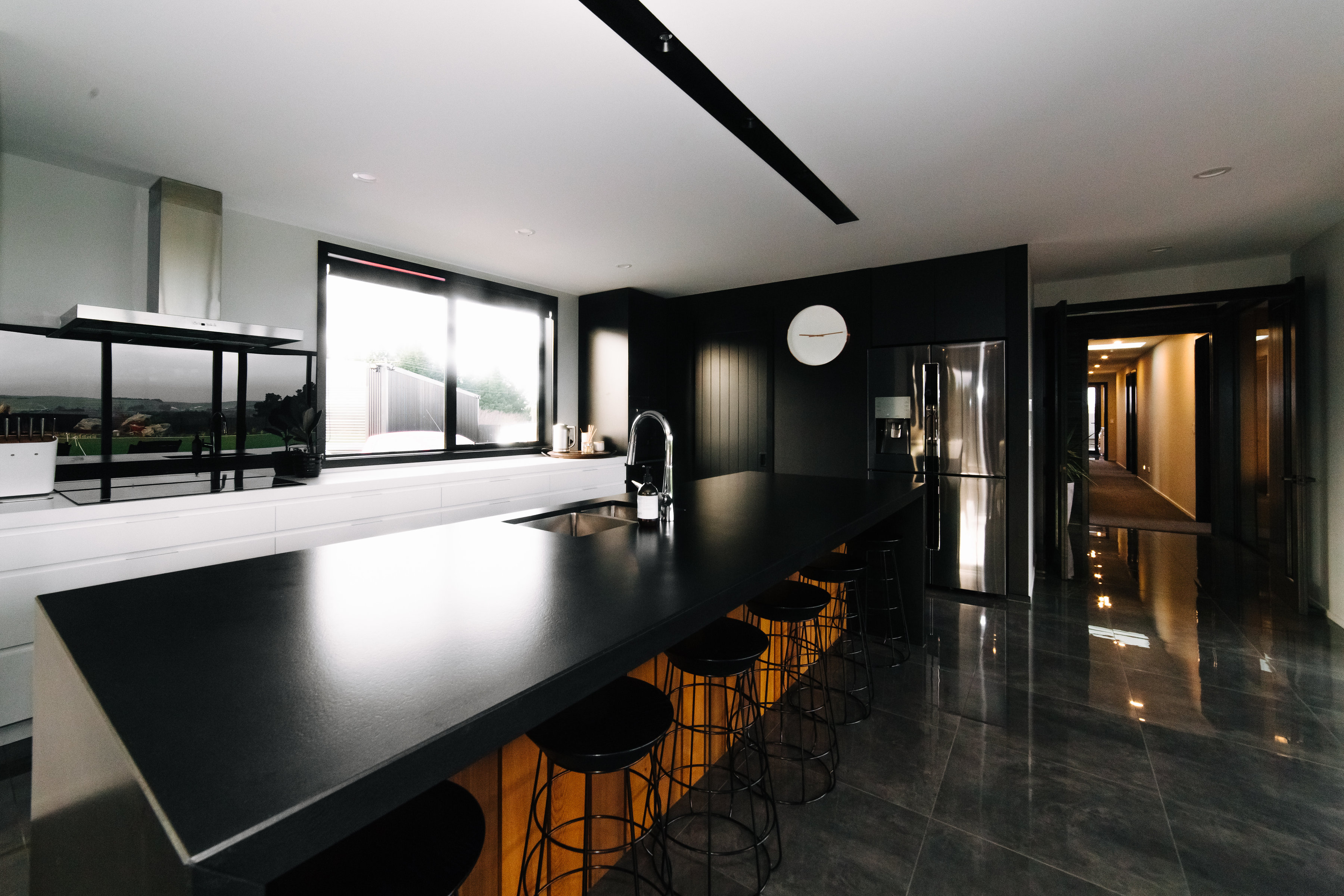 This striking black kitchen is the crown jewel of a contemporary North ...