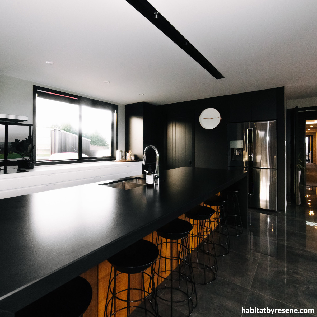 This striking black kitchen is the crown jewel of a contemporary North ...